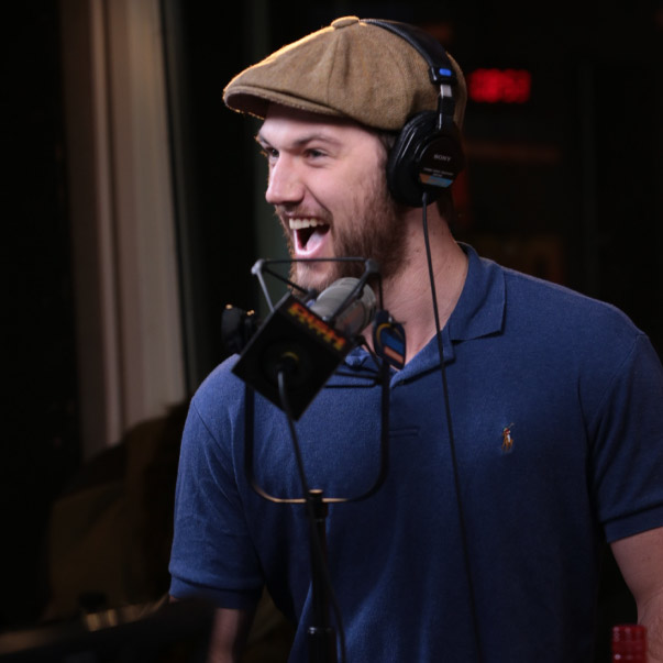 Alex laughing with the cast – KiddNation